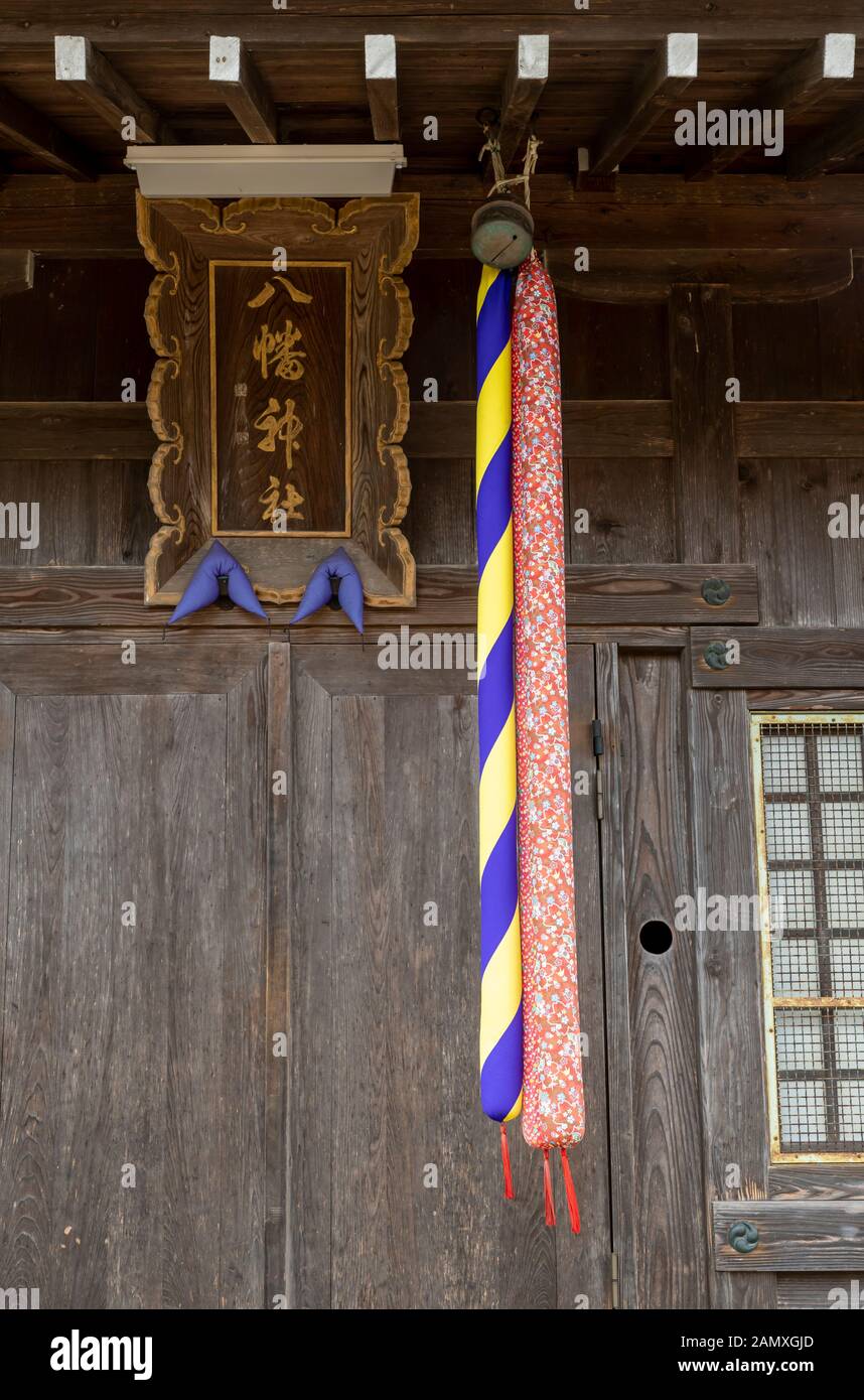 Decorative bell ropes on a Shinto shrine in Shonai, Yamagata Prefecture ...