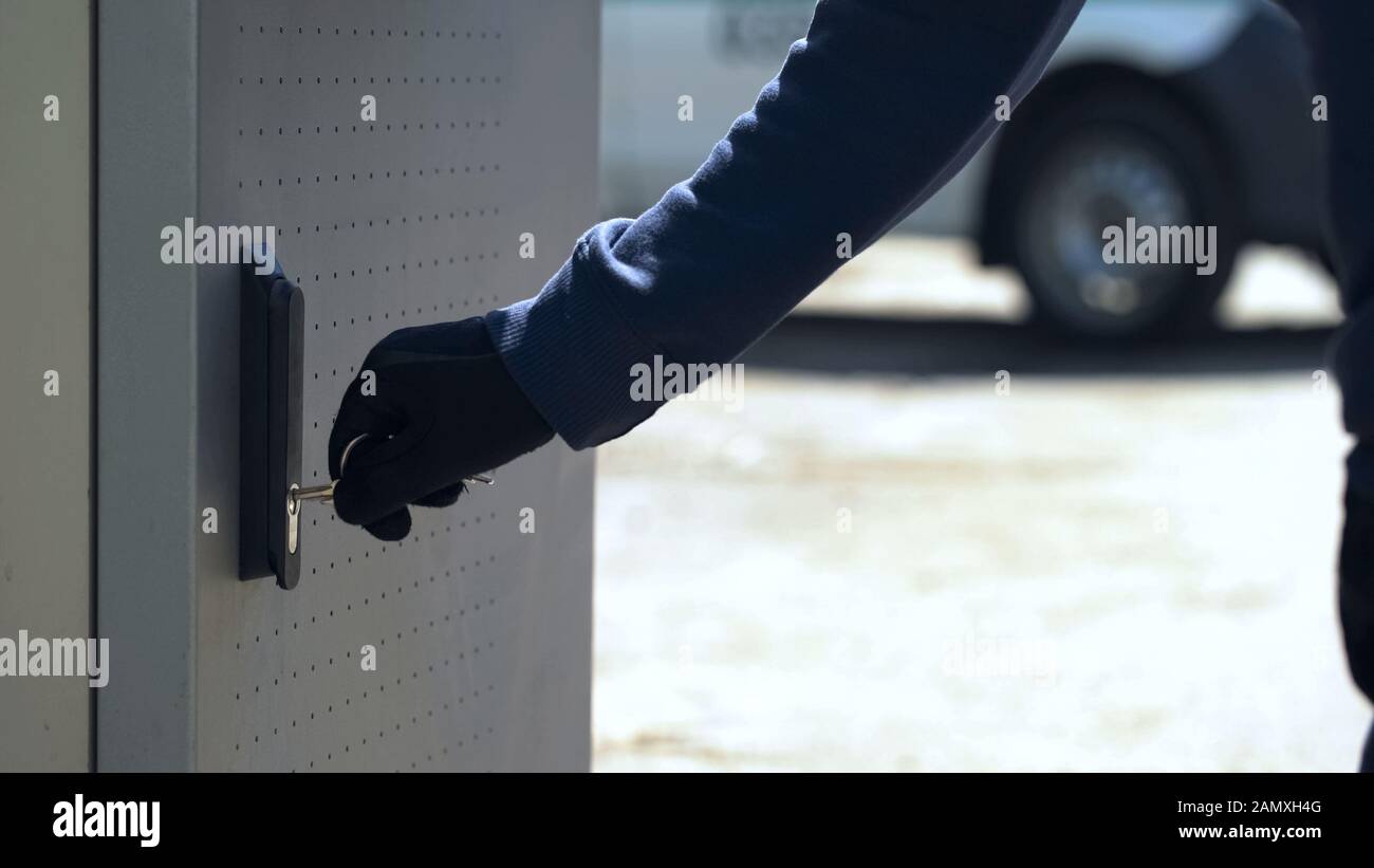 CIT guard opening ATM safe with key to load storage with cash ...