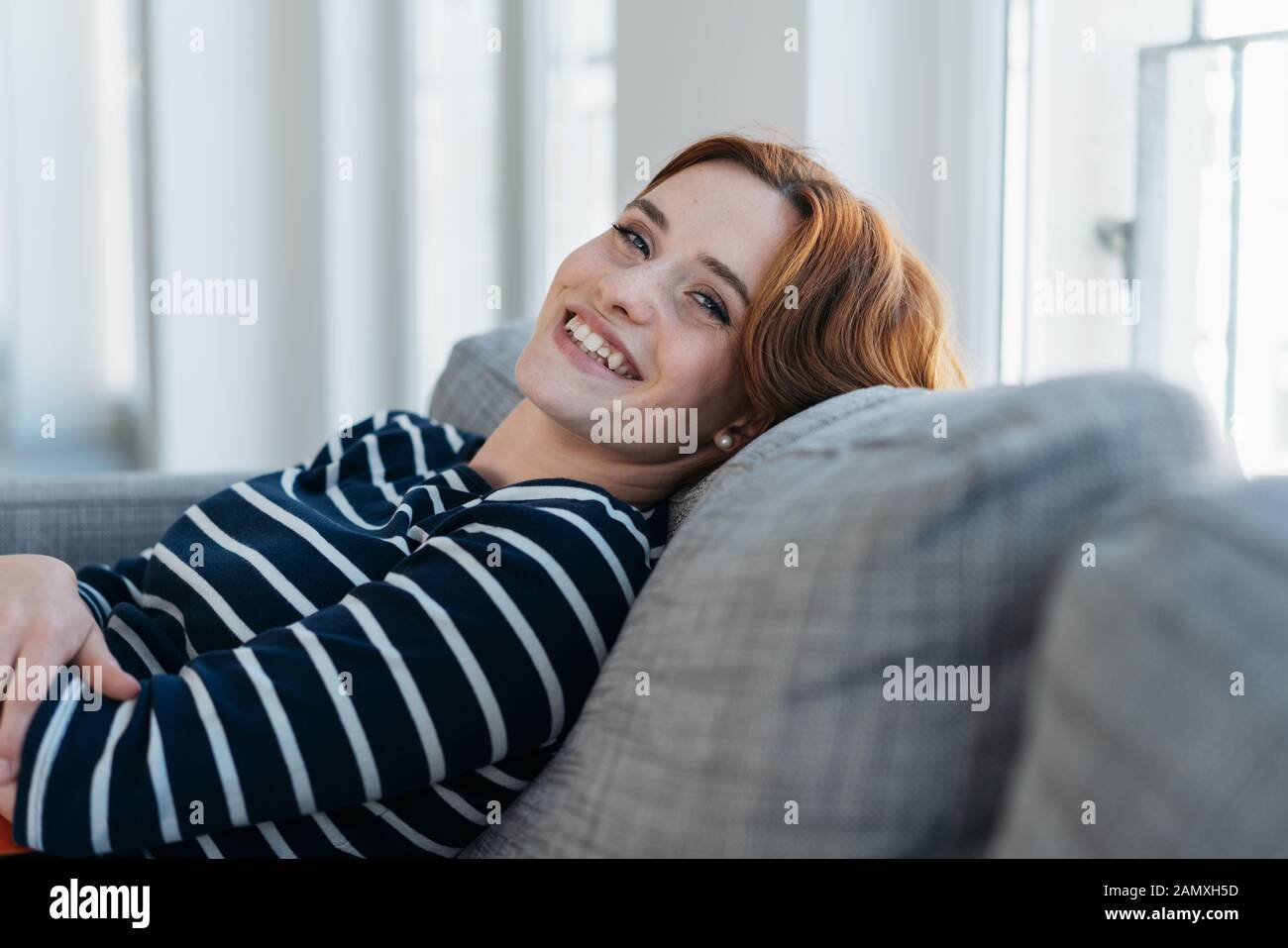 Charming grin hi-res stock photography and images - Alamy