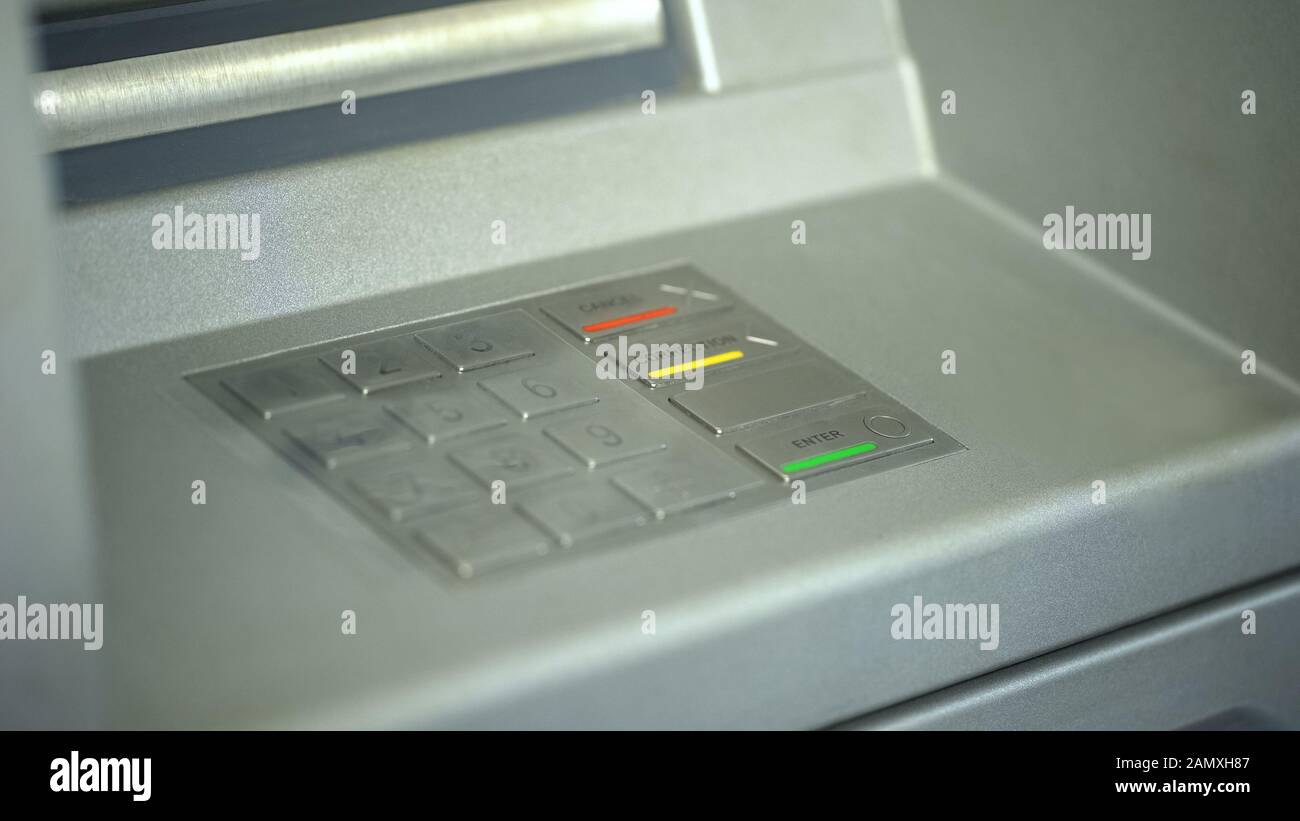 Close up of automated teller machine, buttons on ATM, secure money ...