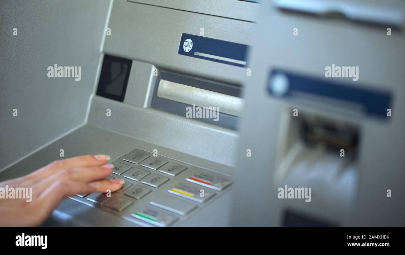 Checking bank balance hi-res stock photography and images - Alamy
