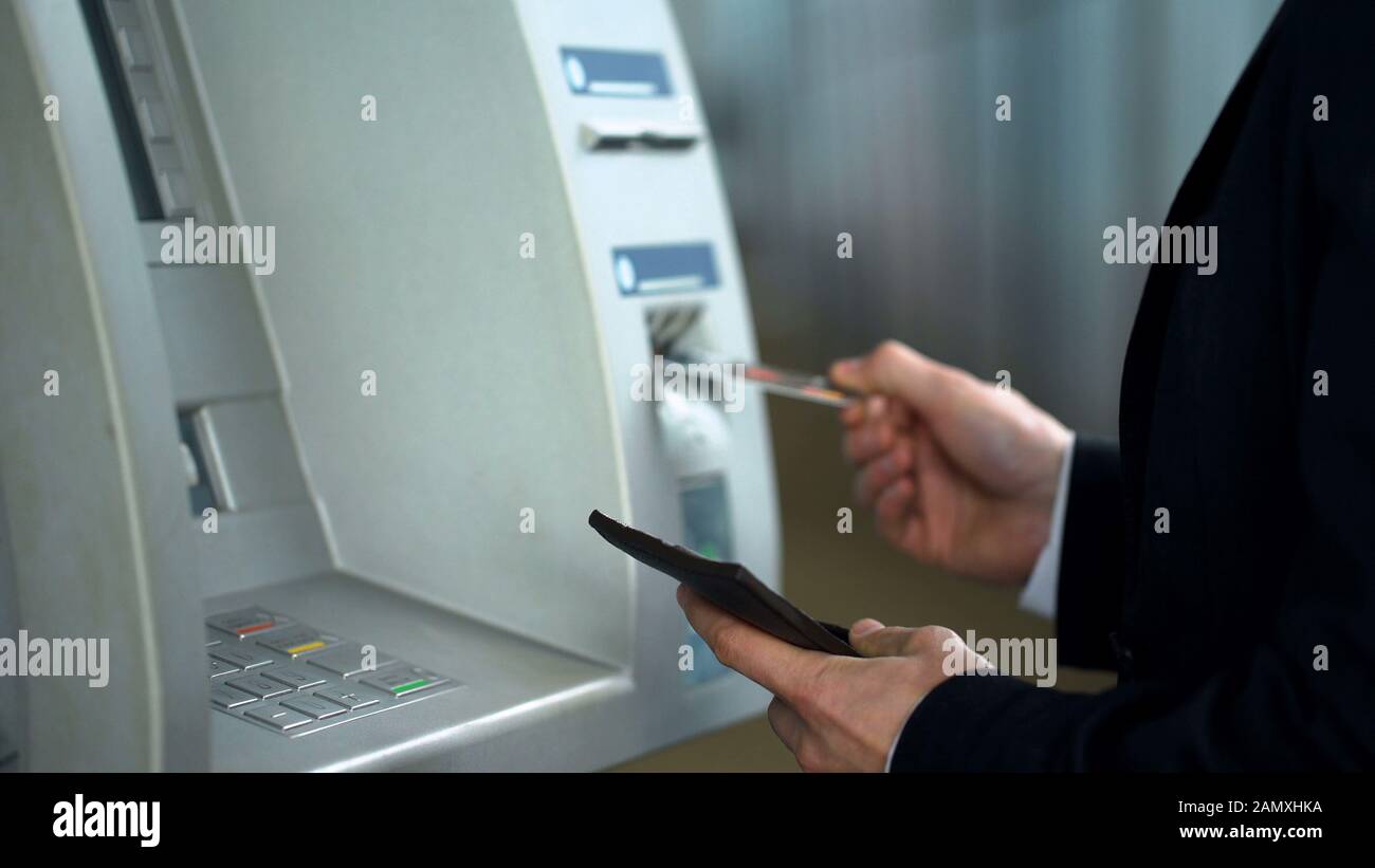 Inserting Credit Card In Atm High Resolution Stock Photography and ...