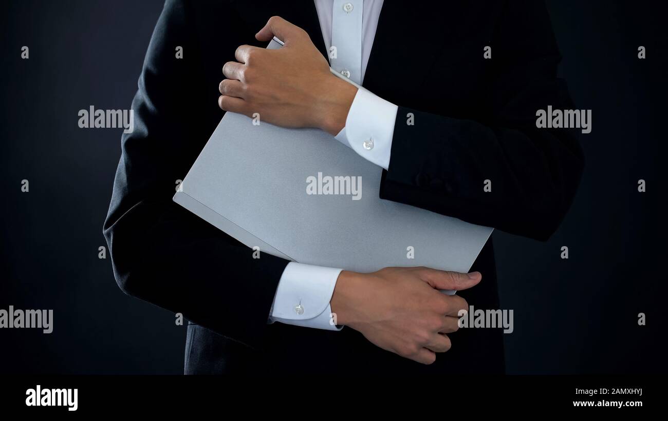 Man protecting laptop computer, information security antivirus, private ...