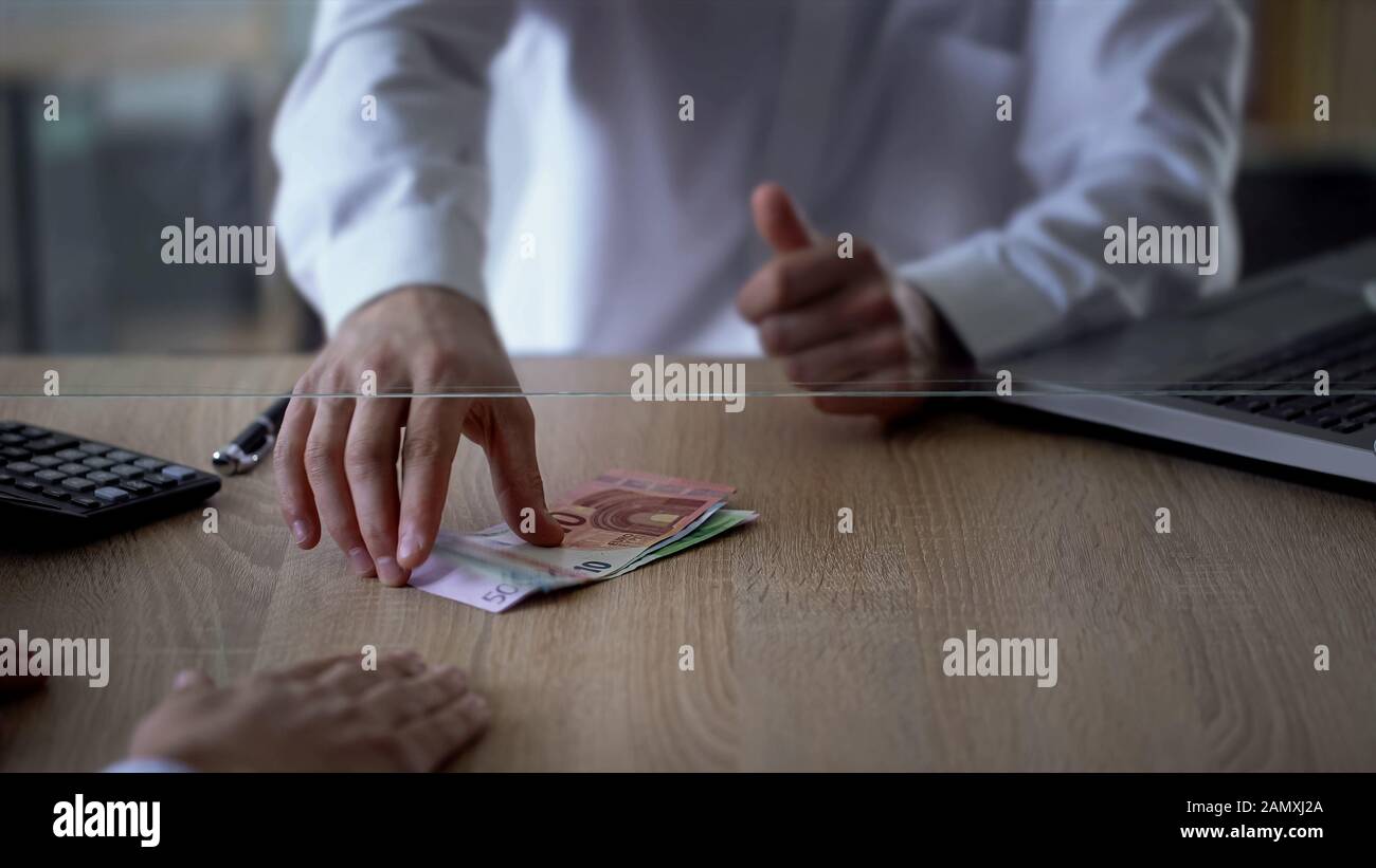 Bank clerk hi-res stock photography and images - Alamy