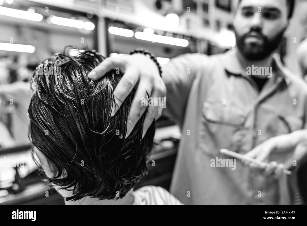 Creating a new hairstyle. Creative haircut from a hairdresser Stock ...