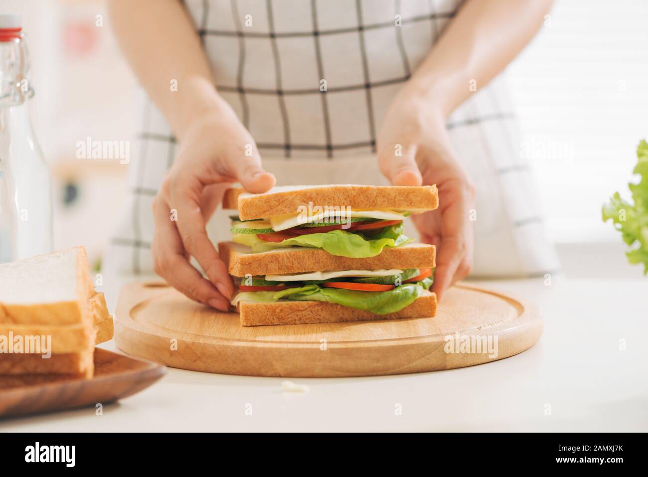 Hands preparing meat sandwich hi-res stock photography and images - Alamy