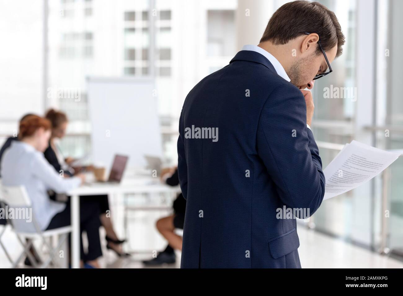 Worried male speaker read notes afraid of public speaking Stock Photo ...