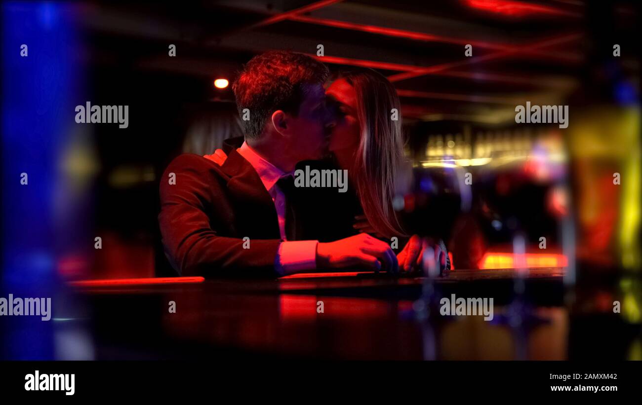 Beautiful girl coming late for date, kissing boyfriend, tender feelings ...