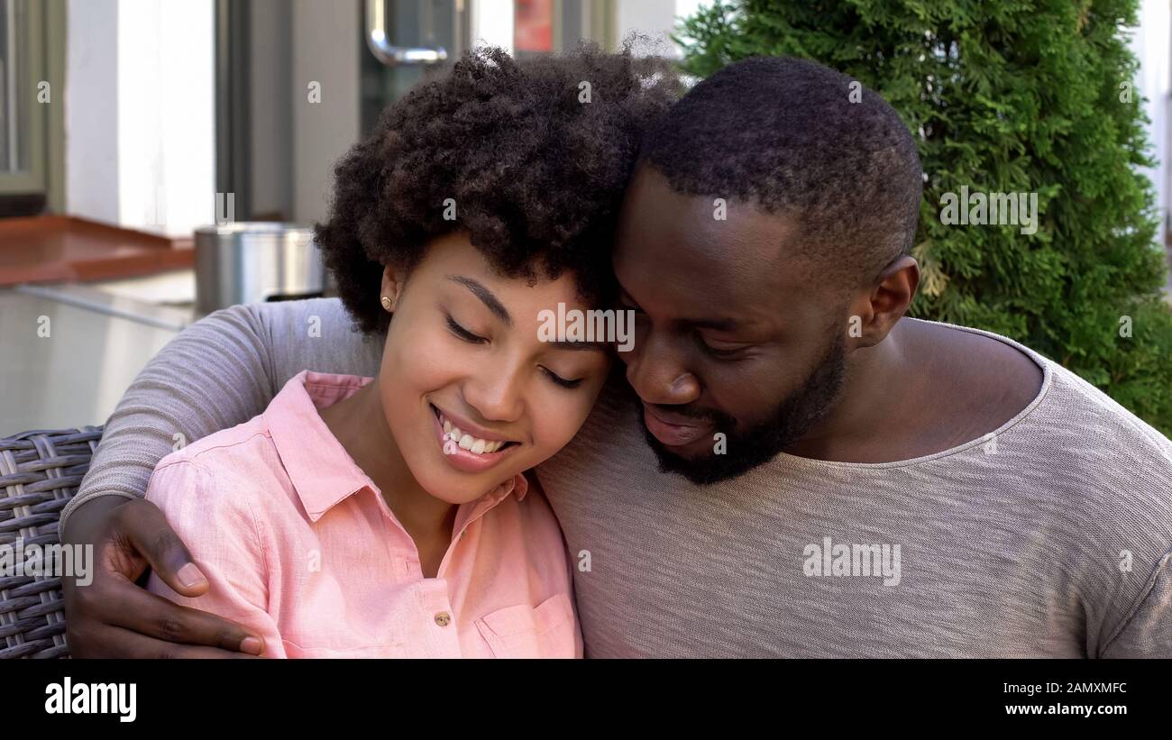 Boyfriend and girlfriend embracing, romantic date in cafe, tender ...