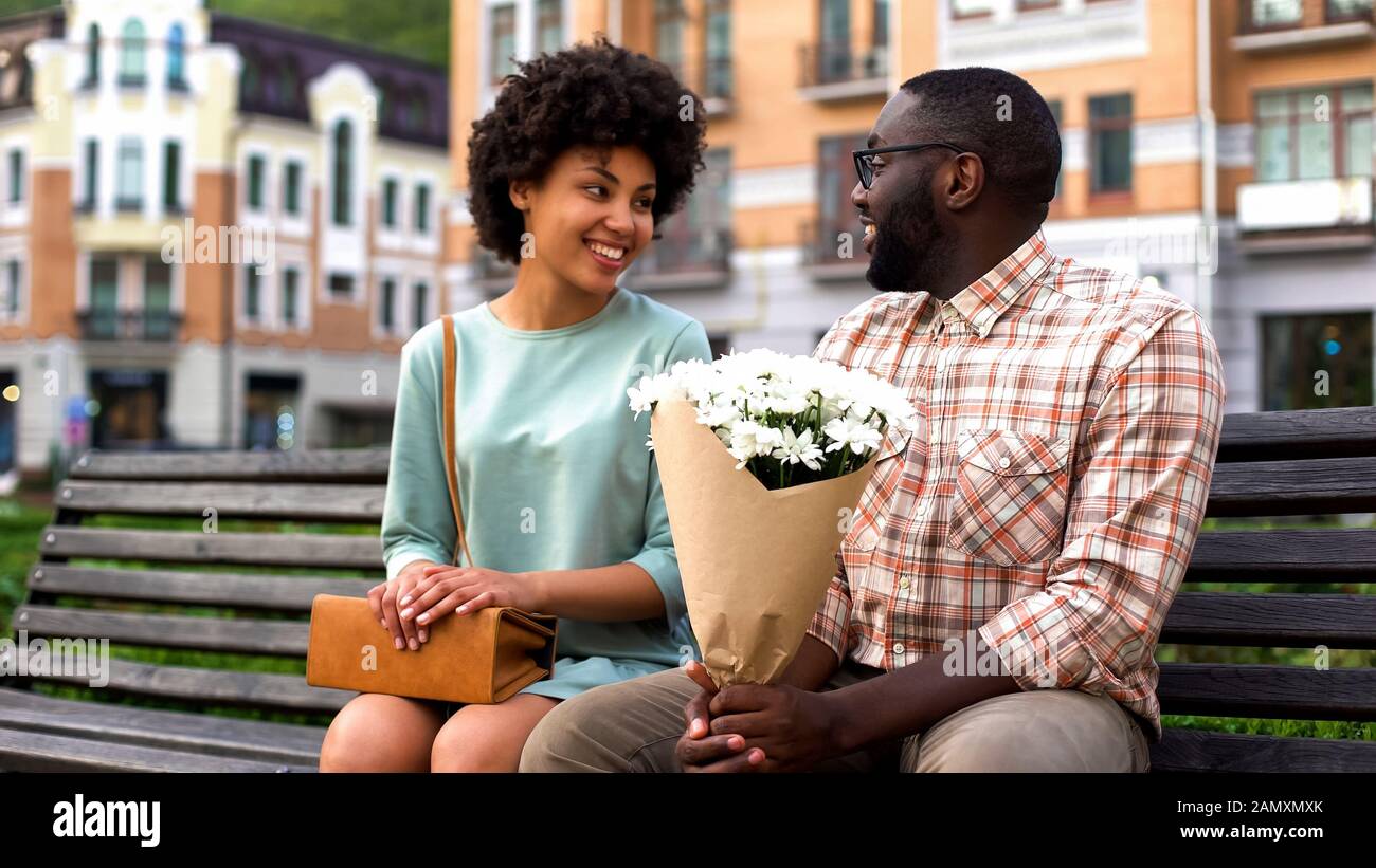 Young man meeting girlfriend park hi-res stock photography and images ...