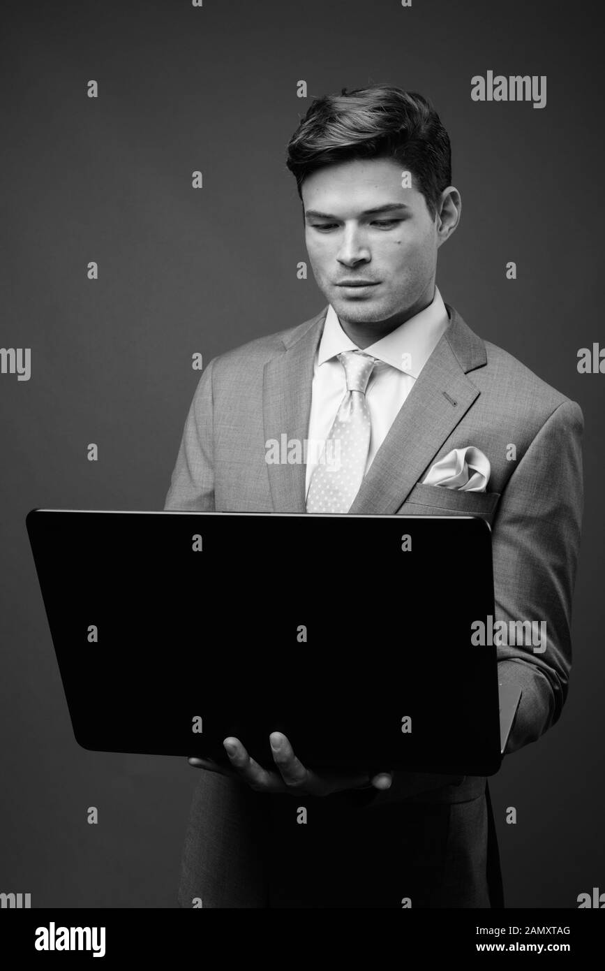 Businessman in formal suit using Black and White Stock Photos & Images ...