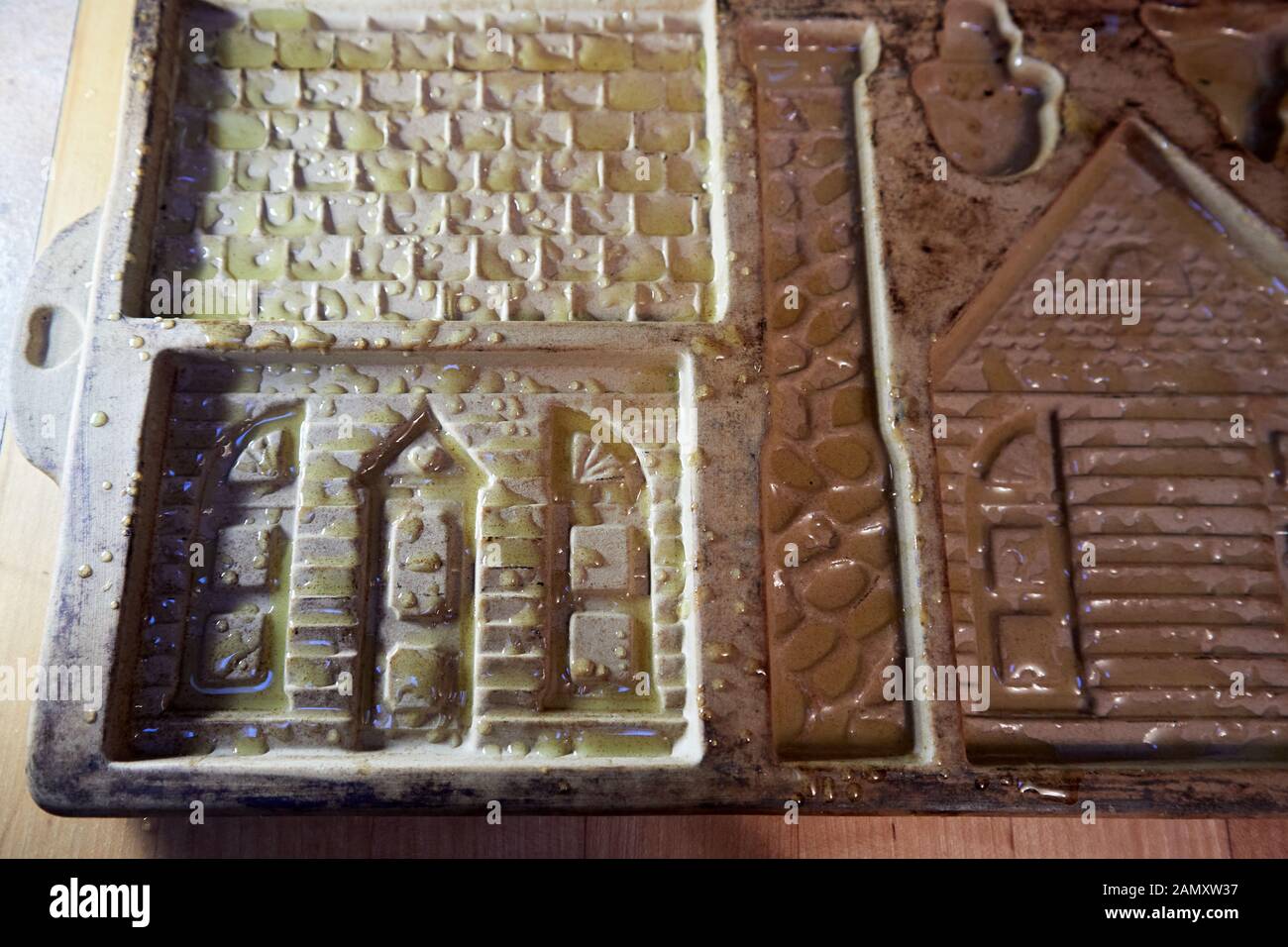 empty gingerbread house mold with oil sprayed on Stock Photo - Alamy