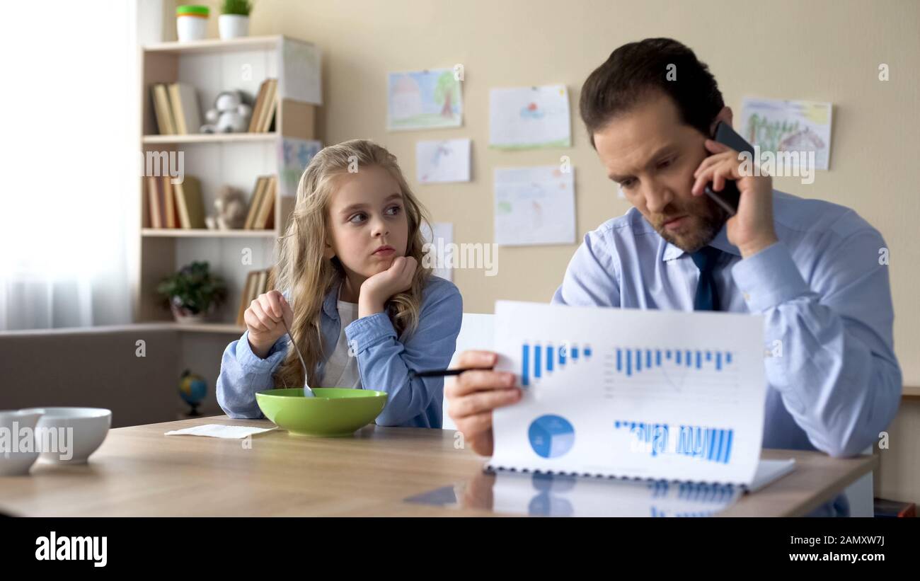 Busy father sad child hi-res stock photography and images - Alamy