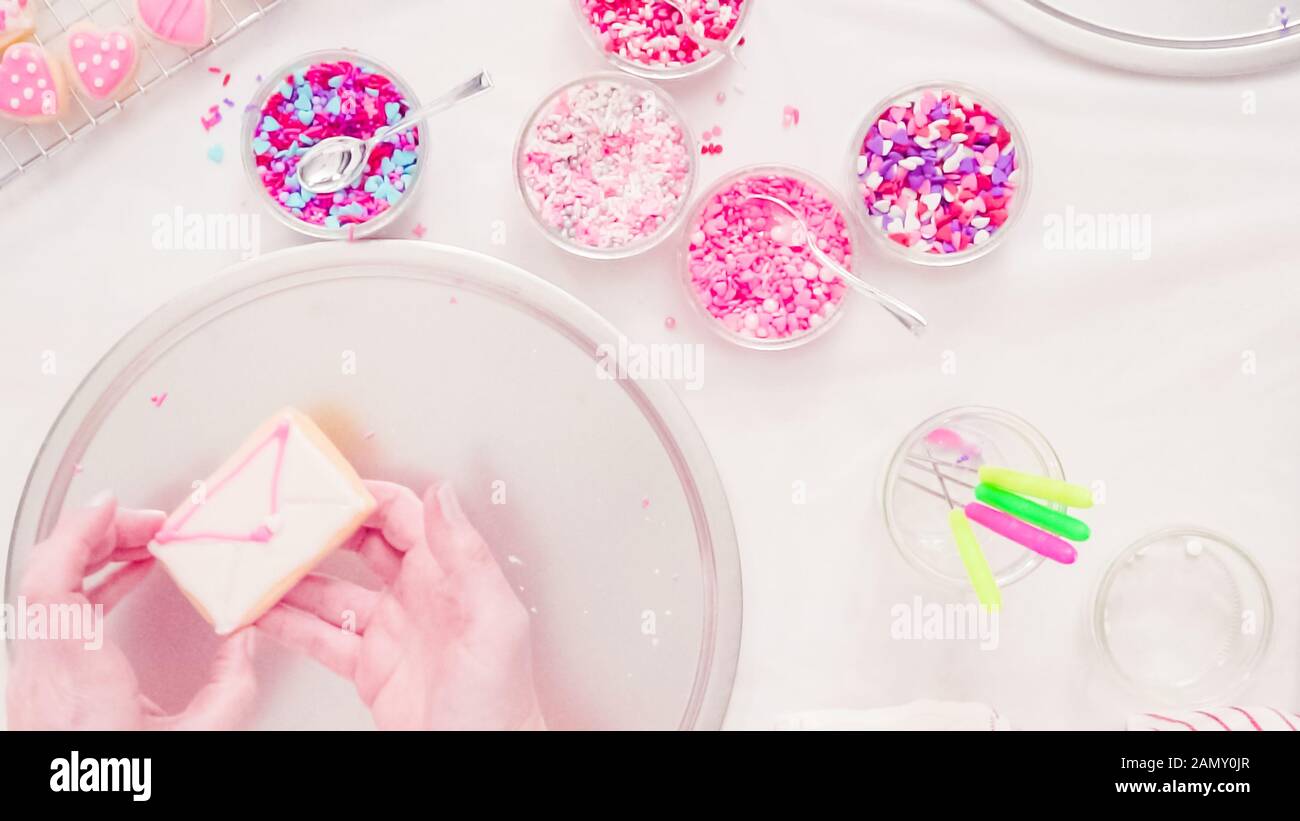 Flat lay. Step by step. Decorating sugar cookies with royal icing and ...
