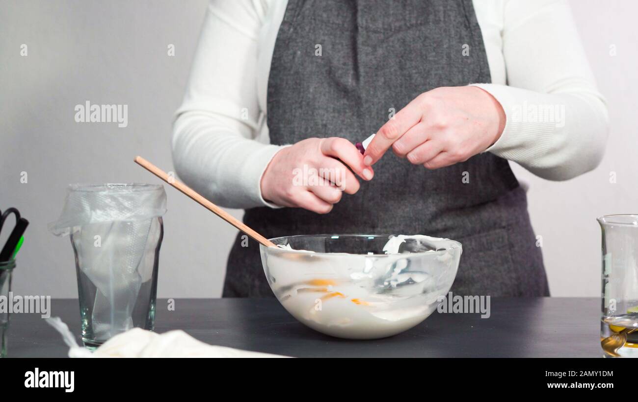 Step by step. Mixing in food coloring into the royal icing to decorate ...