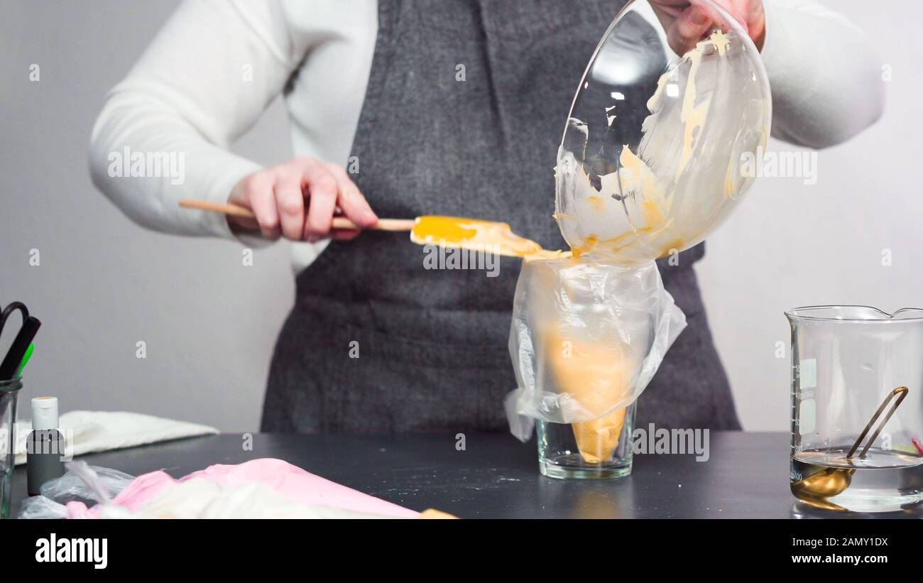 Step by step. Pouring royal icing into the piping bag to decorate sugar ...