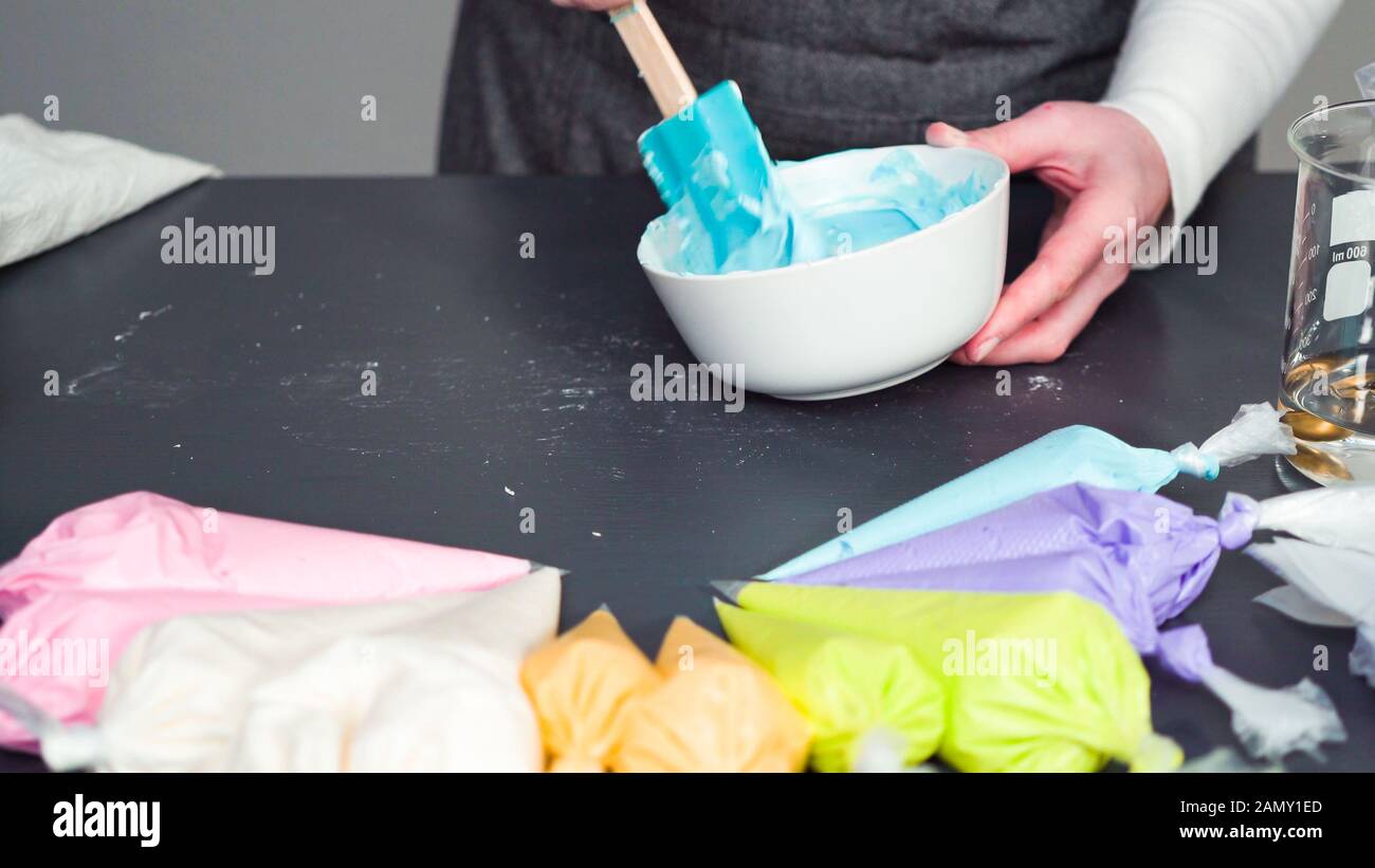 Step by step. Mixing in food coloring into the royal icing to decorate ...
