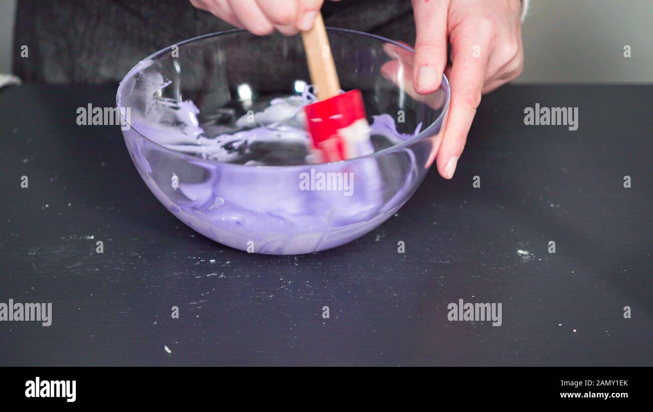 Step by step. Mixing in food coloring into the royal icing to decorate ...