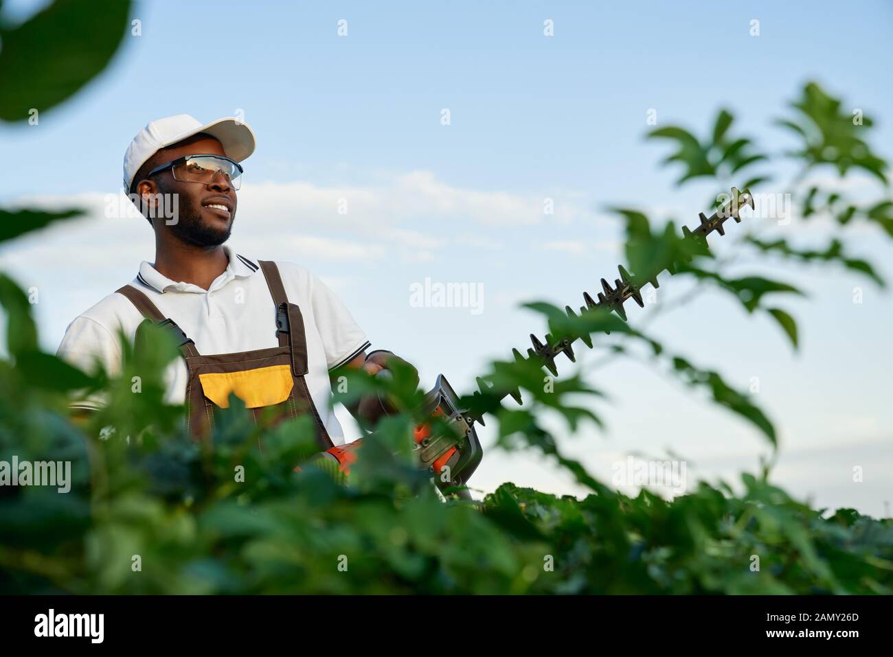 African man working in garden hi-res stock photography and images - Alamy