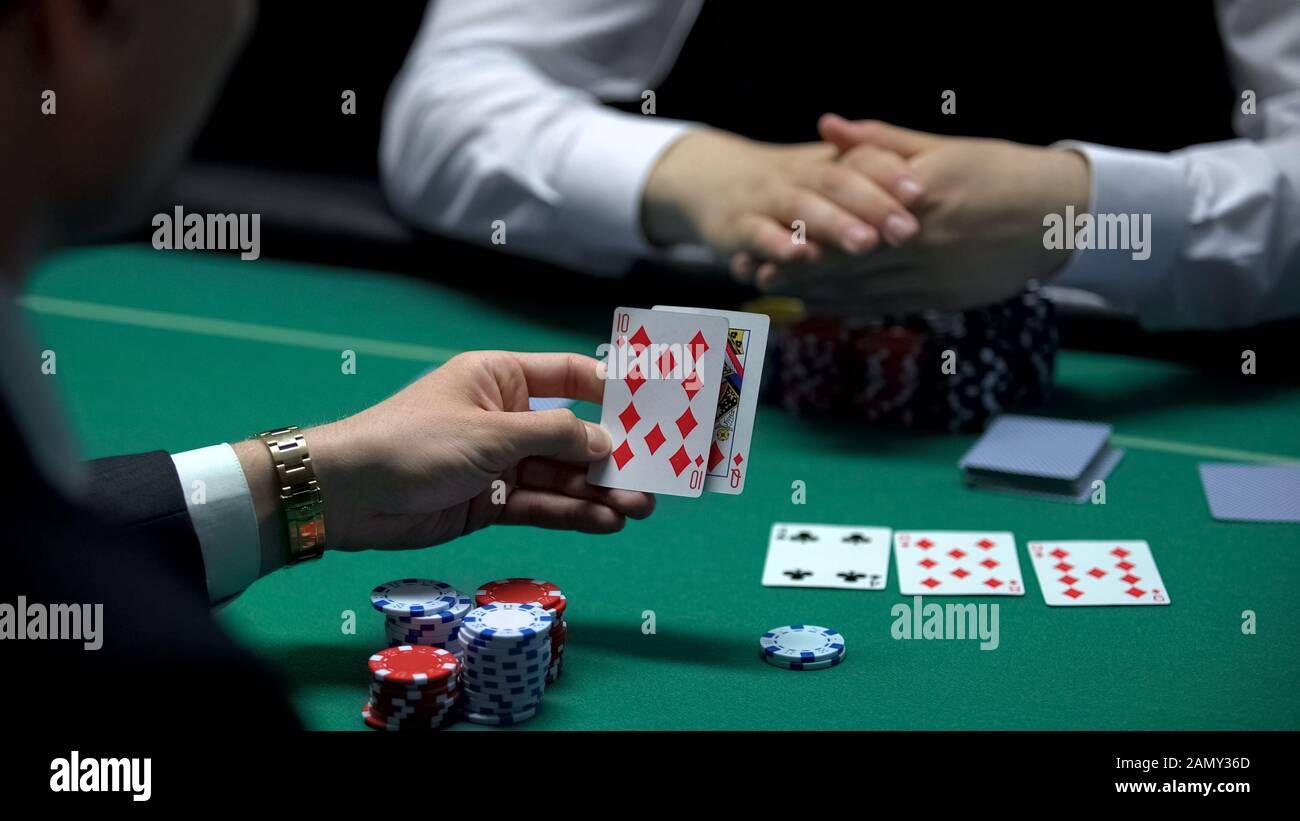 Businessman playing cards hi-res stock photography and images - Alamy