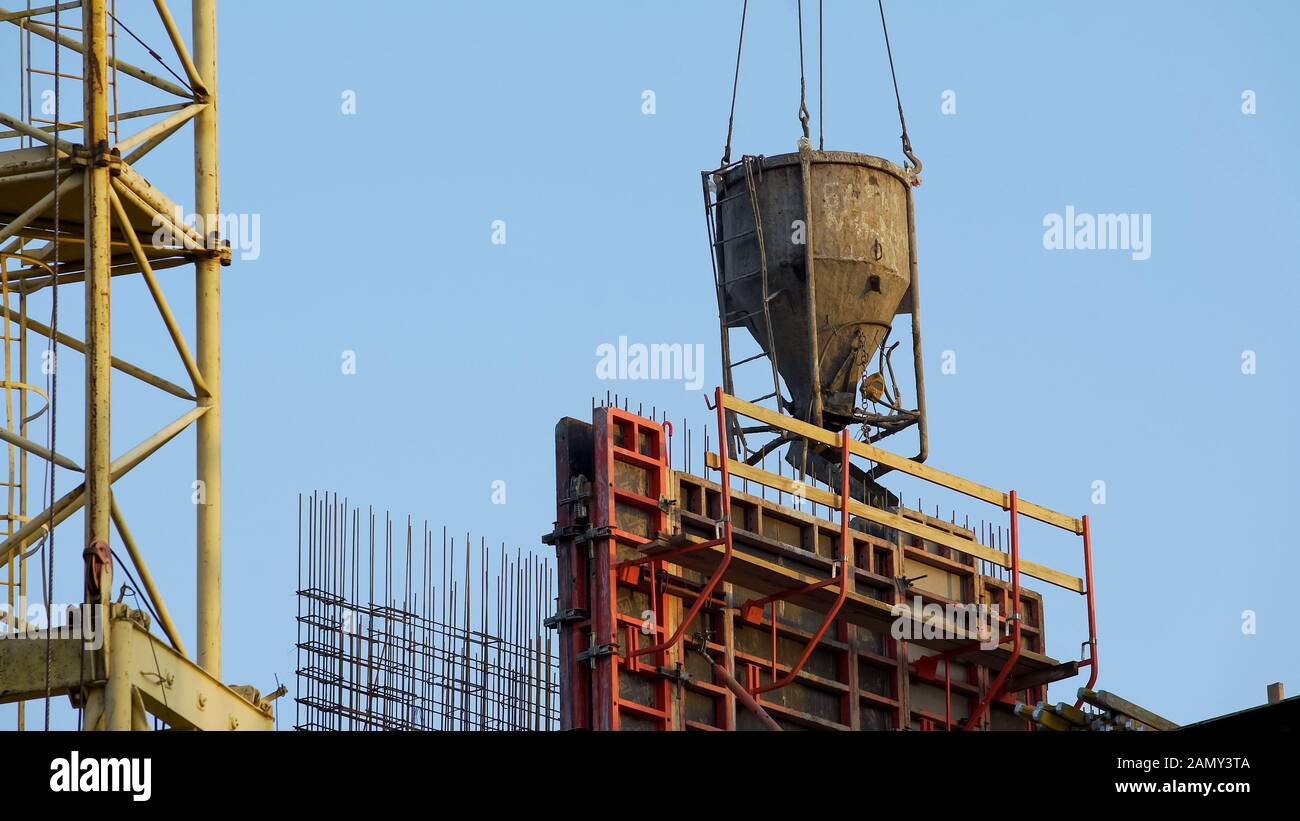 Pouring concrete crane hi-res stock photography and images - Alamy
