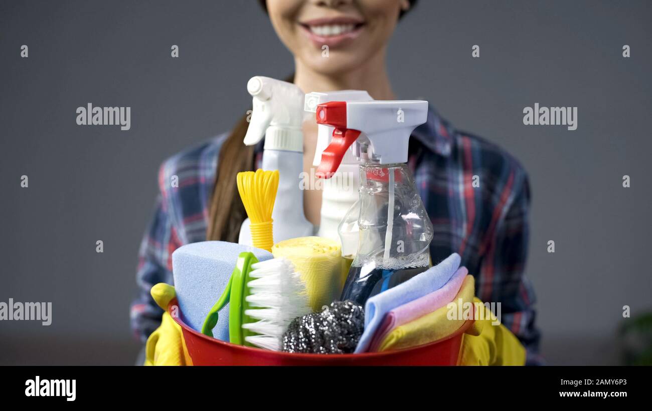 Happy cleaning service employee ready to start working, positive work ...