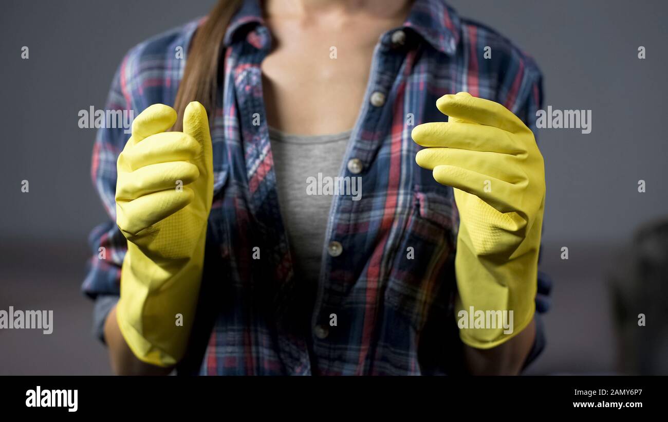 Woman stretching up clean kitchen hi-res stock photography and images ...