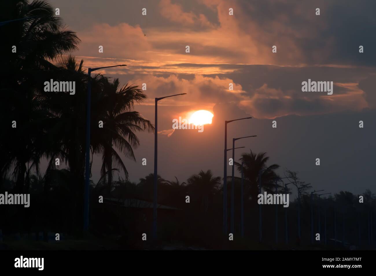 Setting sun. Sunset Sundown. Evening sky. Disappearance of Sun below ...