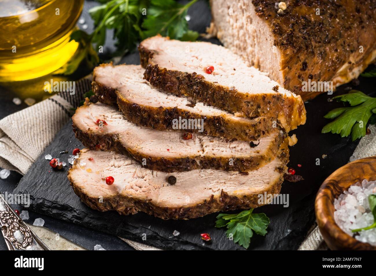 Baked pork meat ham on black Stock Photo - Alamy