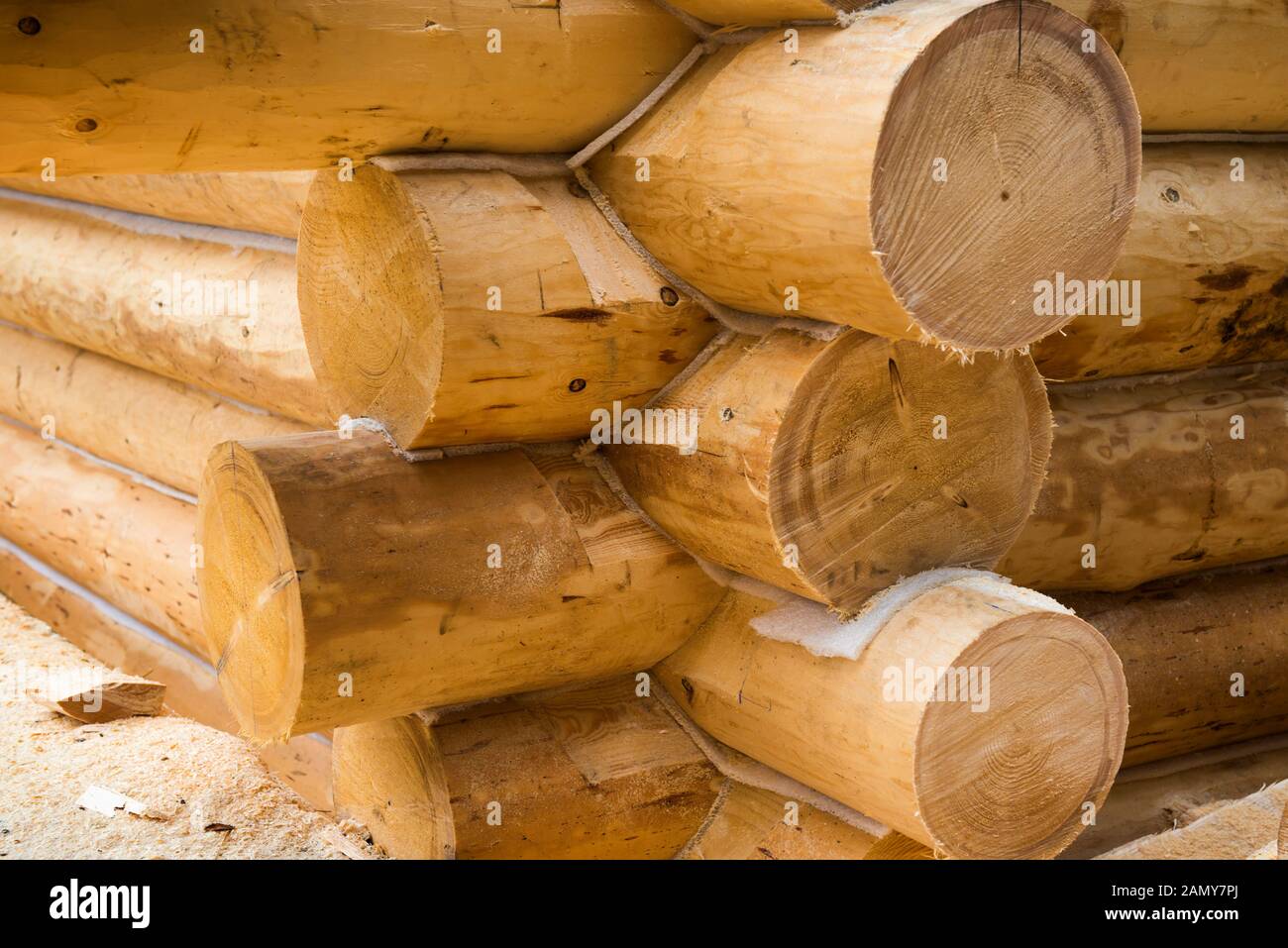 Wall under construction of country wooden house. Details of the ...