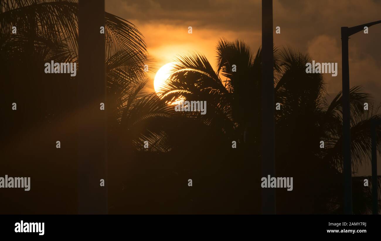 Setting sun. Sunset Sundown. Evening sky. Disappearance of Sun below ...