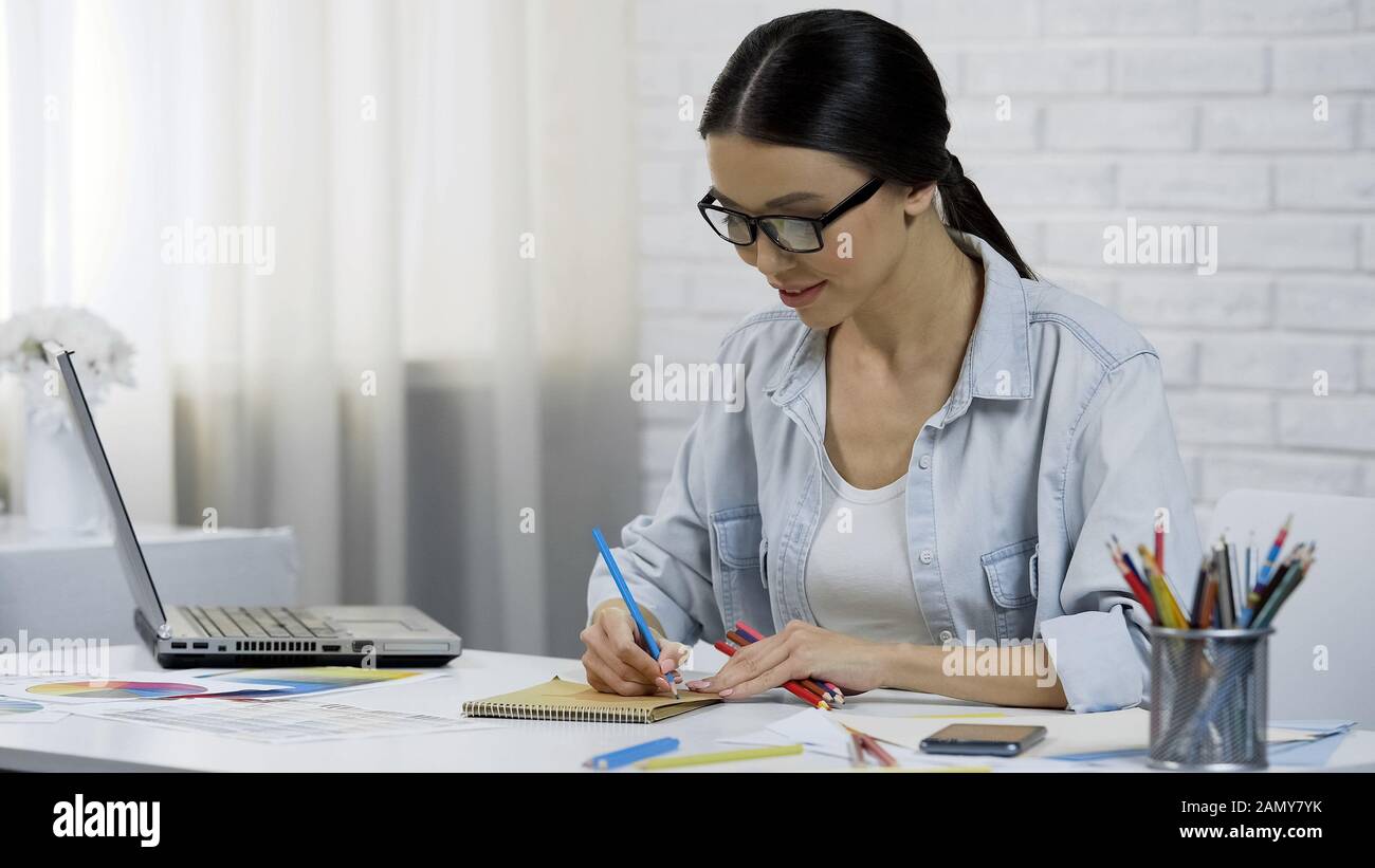 Inspired designer creating project, freelancer enjoying work drawing ...