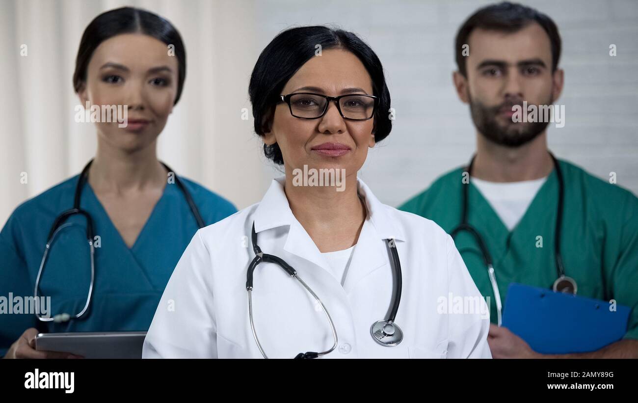 High-qualified surgeon, nurses ready to help patients, professional ...