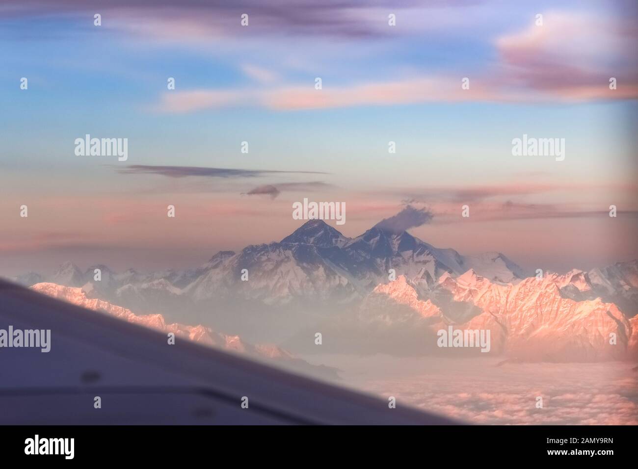 Mount Everest and mountain range during dusk seen from flight Stock ...