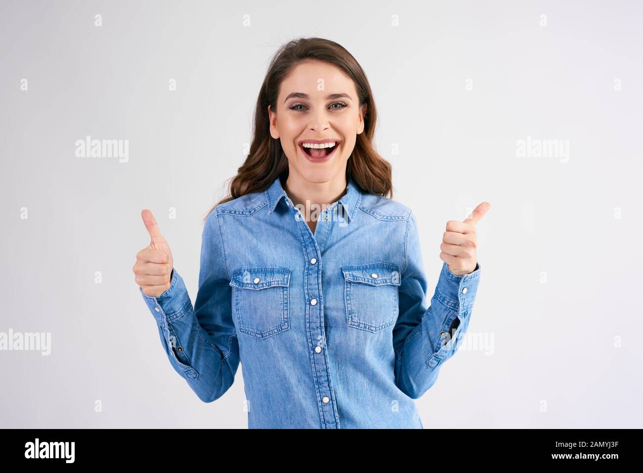 Excited woman thumbs up hi-res stock photography and images - Alamy
