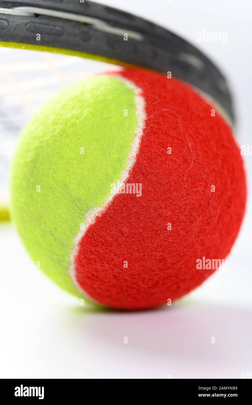 tennis ball and racket close up vertical composition Stock Photo - Alamy