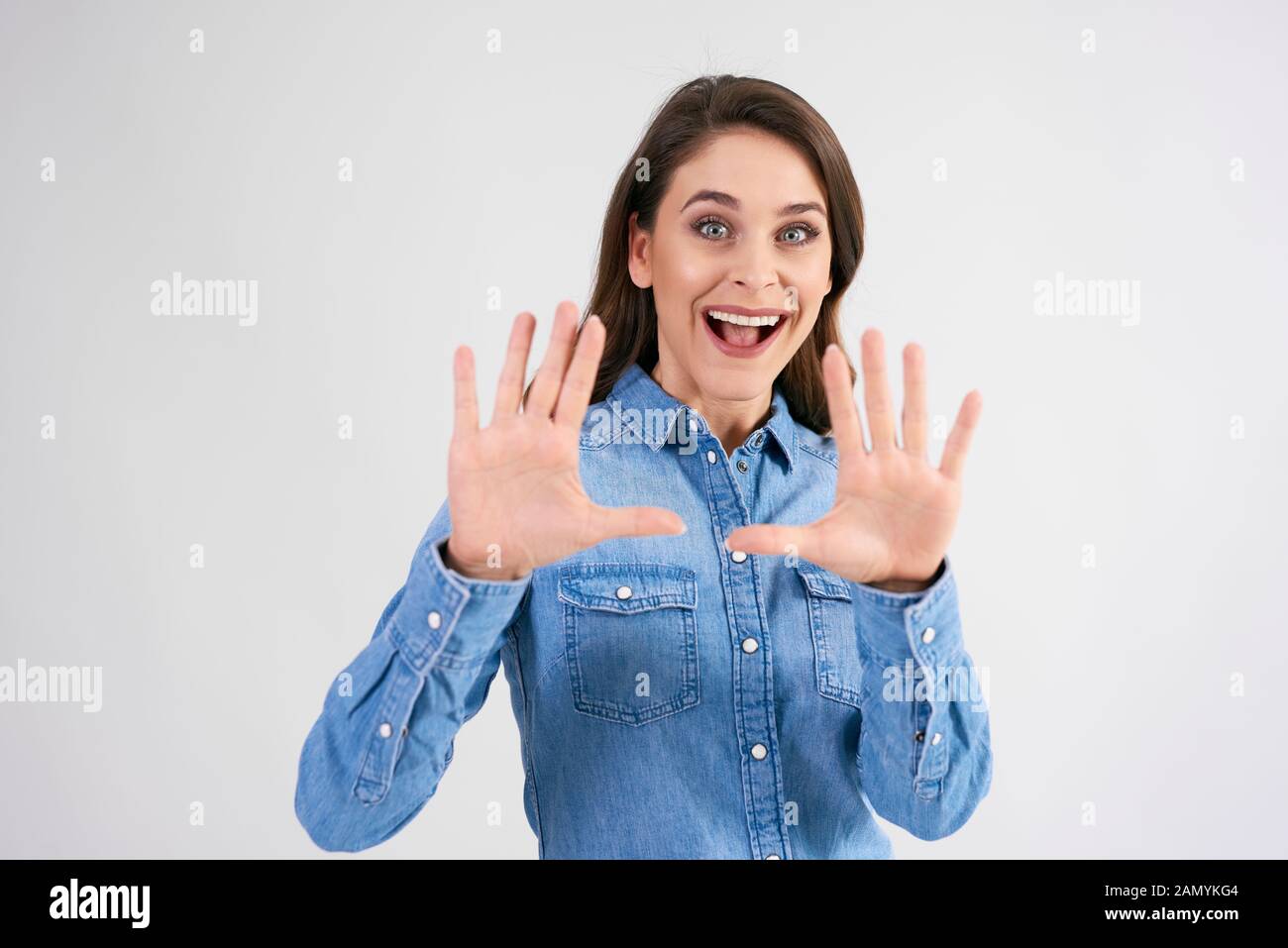 Female hands framing composition in studio shot Stock Photo - Alamy