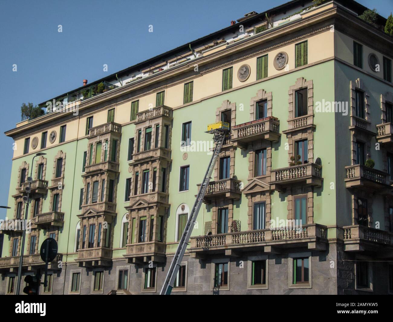 Relocation from a tall building using a ladder with a platform floor ...