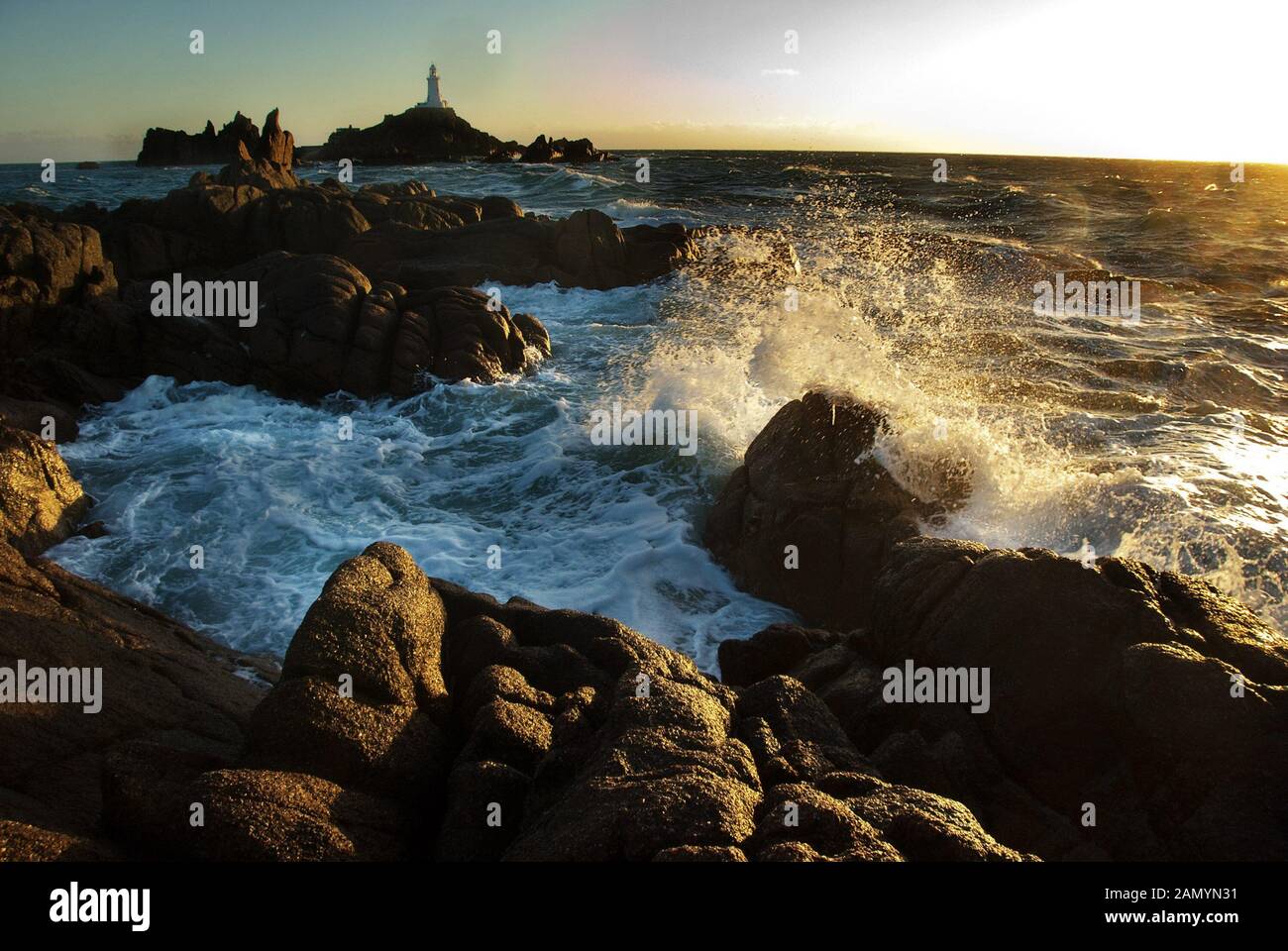 Lighthouse la corbiere on jersey at sunset hi-res stock photography and ...
