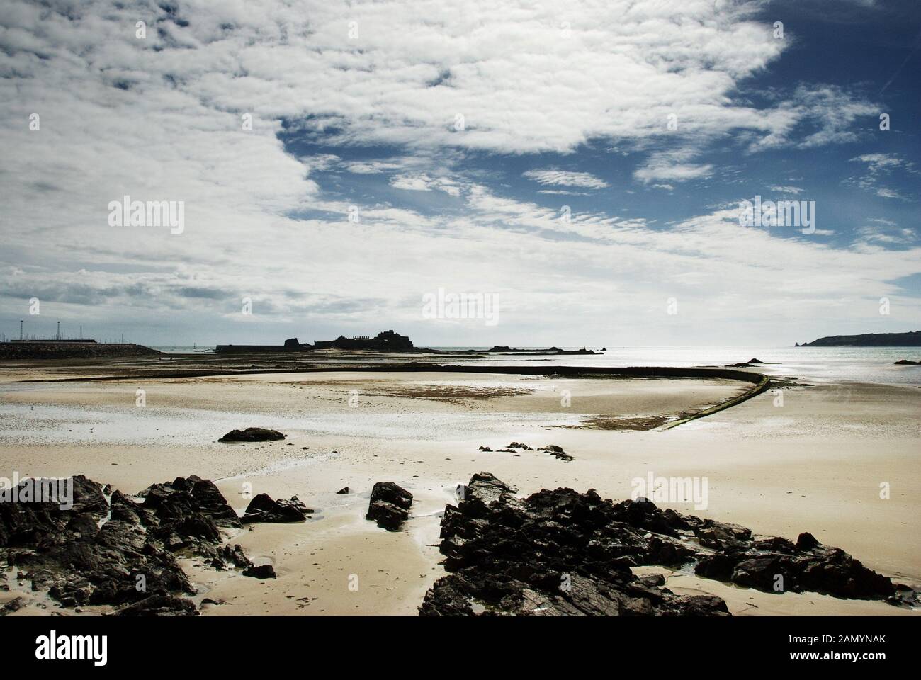 View of St Elizabeth Castle Jersey Channel Islands. St Helier Beach ...