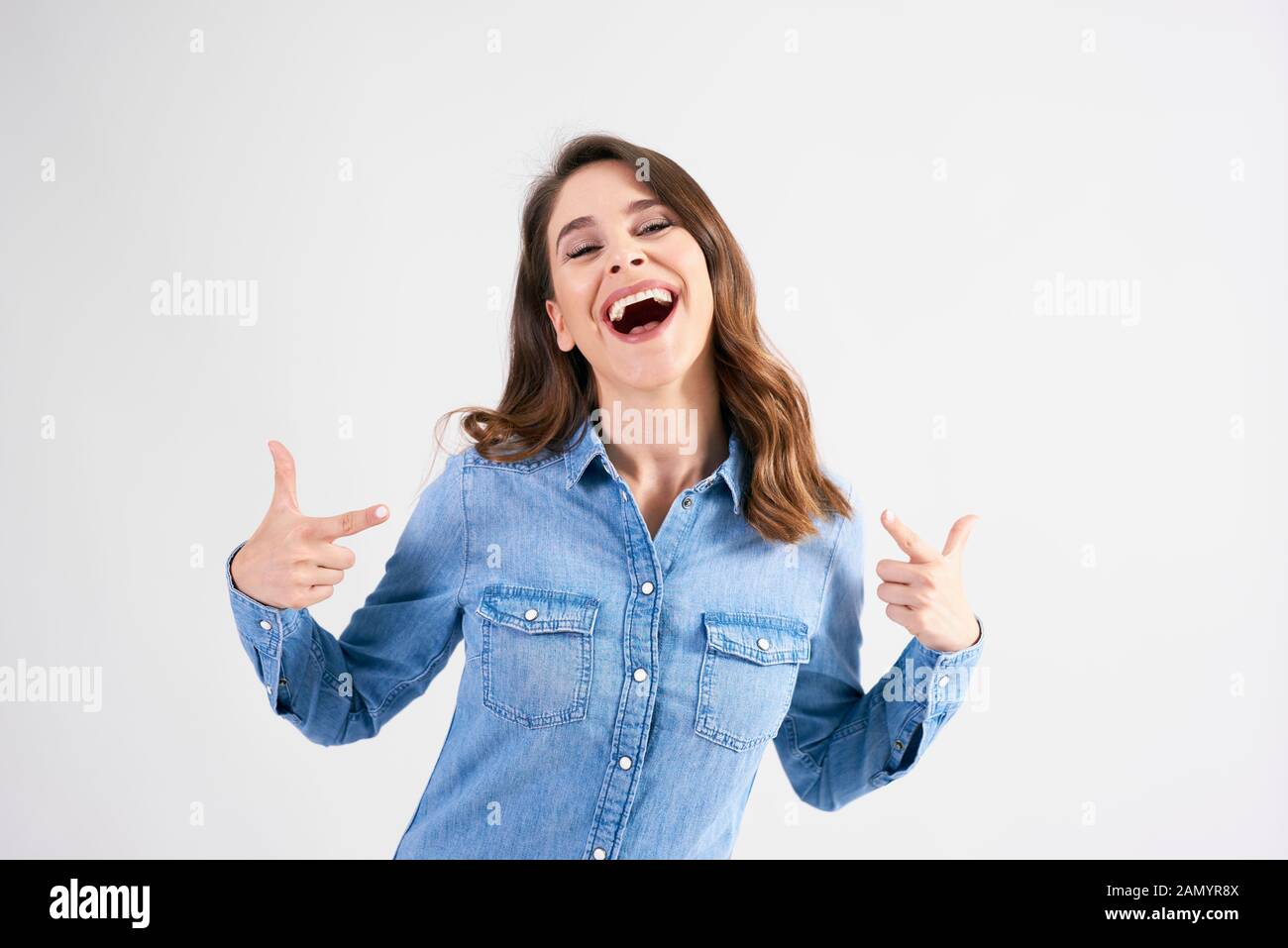 Woman point herself hi-res stock photography and images - Alamy