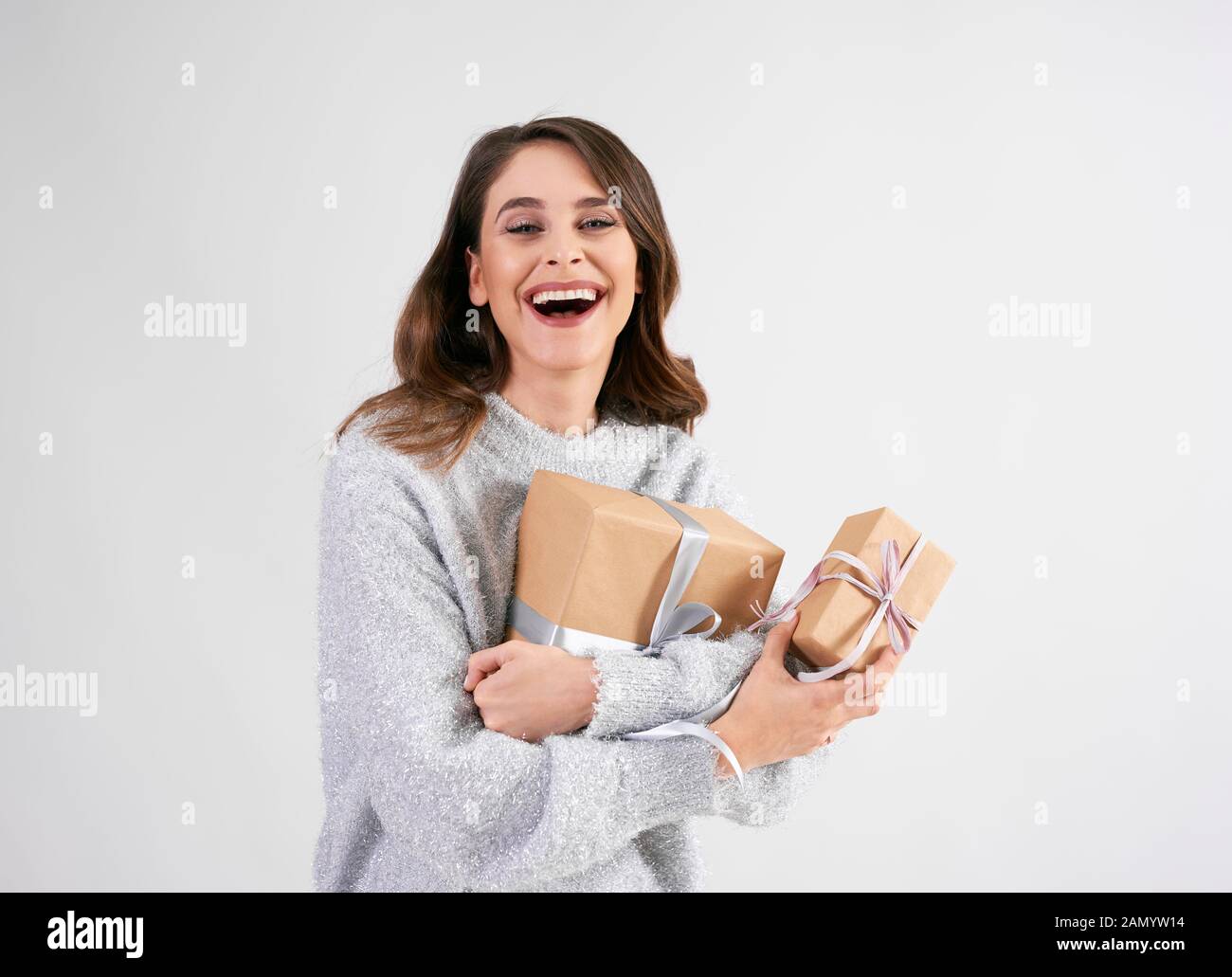 Two gifts in woman hi-res stock photography and images - Alamy
