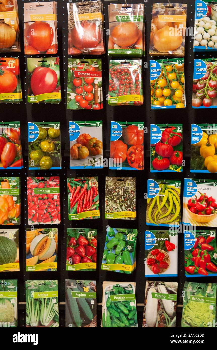 colourful seed packages on display on a rack at a florist Photographed ...