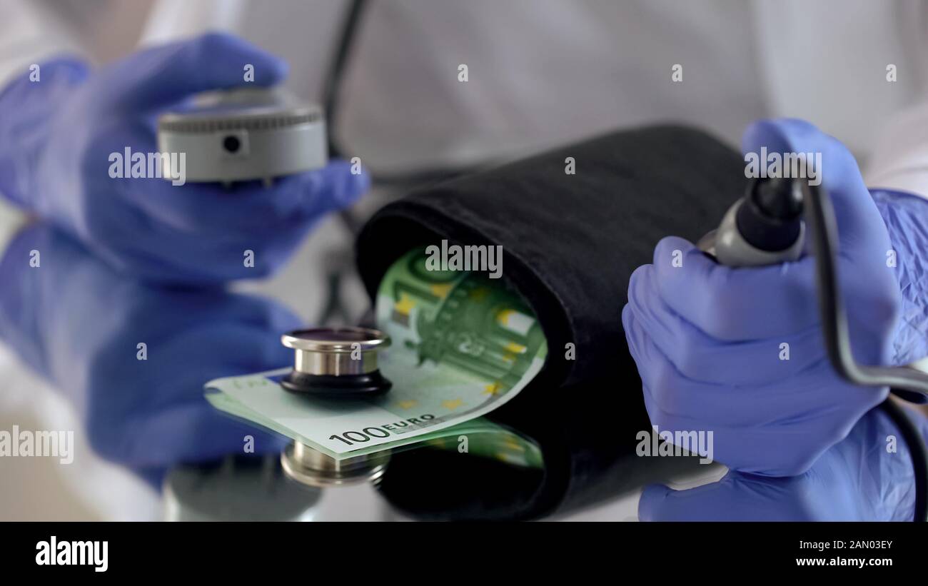 Measuring of euro pressure, expensive medical examination, overpriced ...