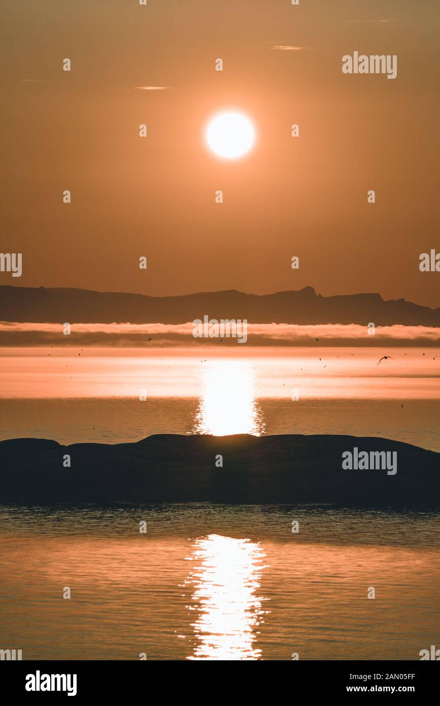 Beautiful Sunset with mountains and icebergs. Arctic circle and ocean ...