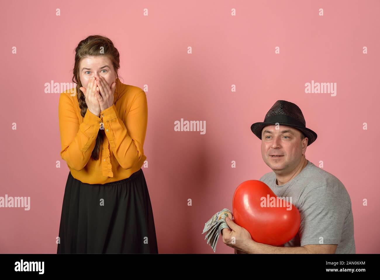 A man gives a balloon, in the form of the heart of his beloved ...