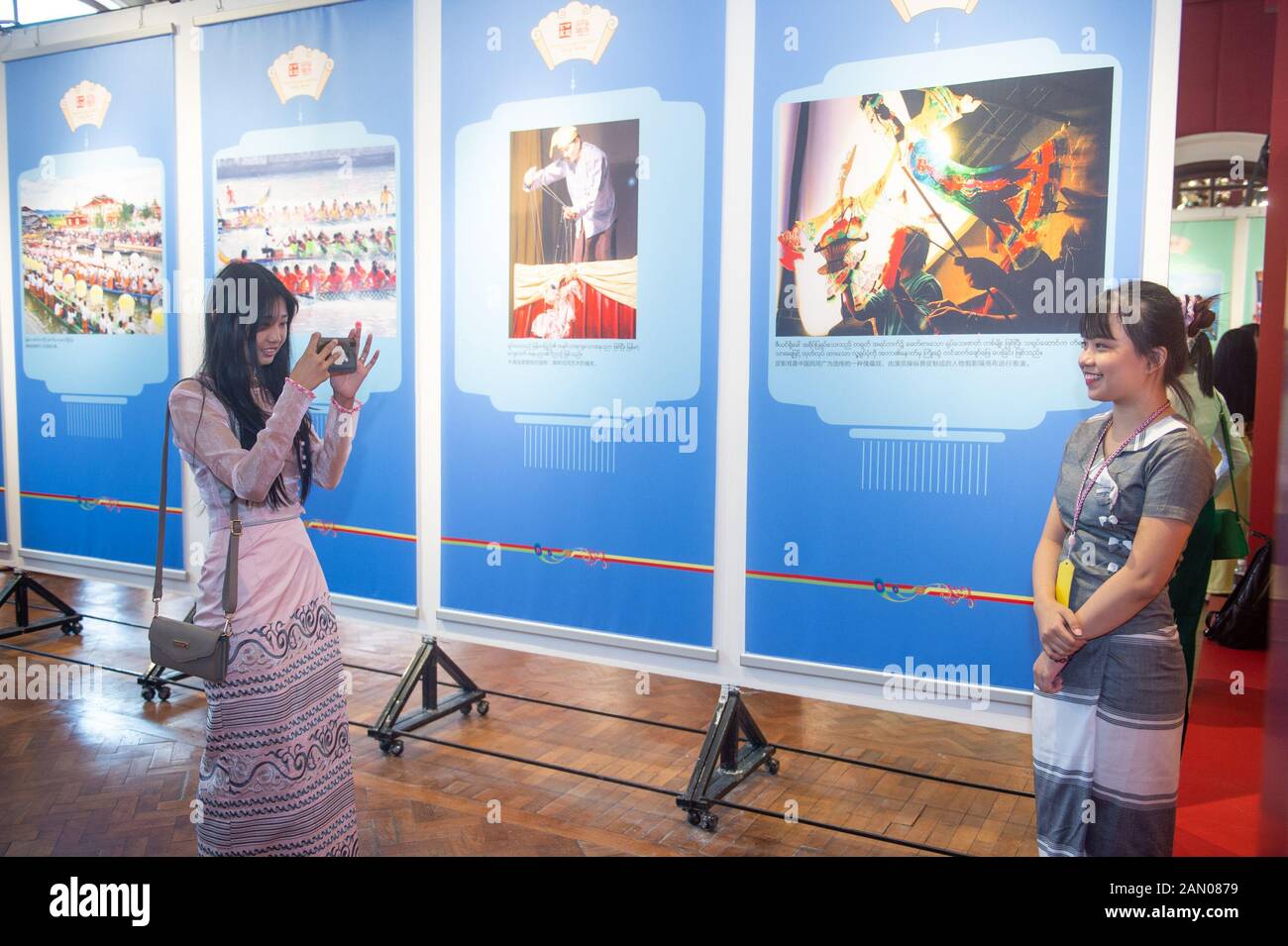 Yangon, Myanmar. 15th Jan, 2020. People visit a photo exhibition in ...