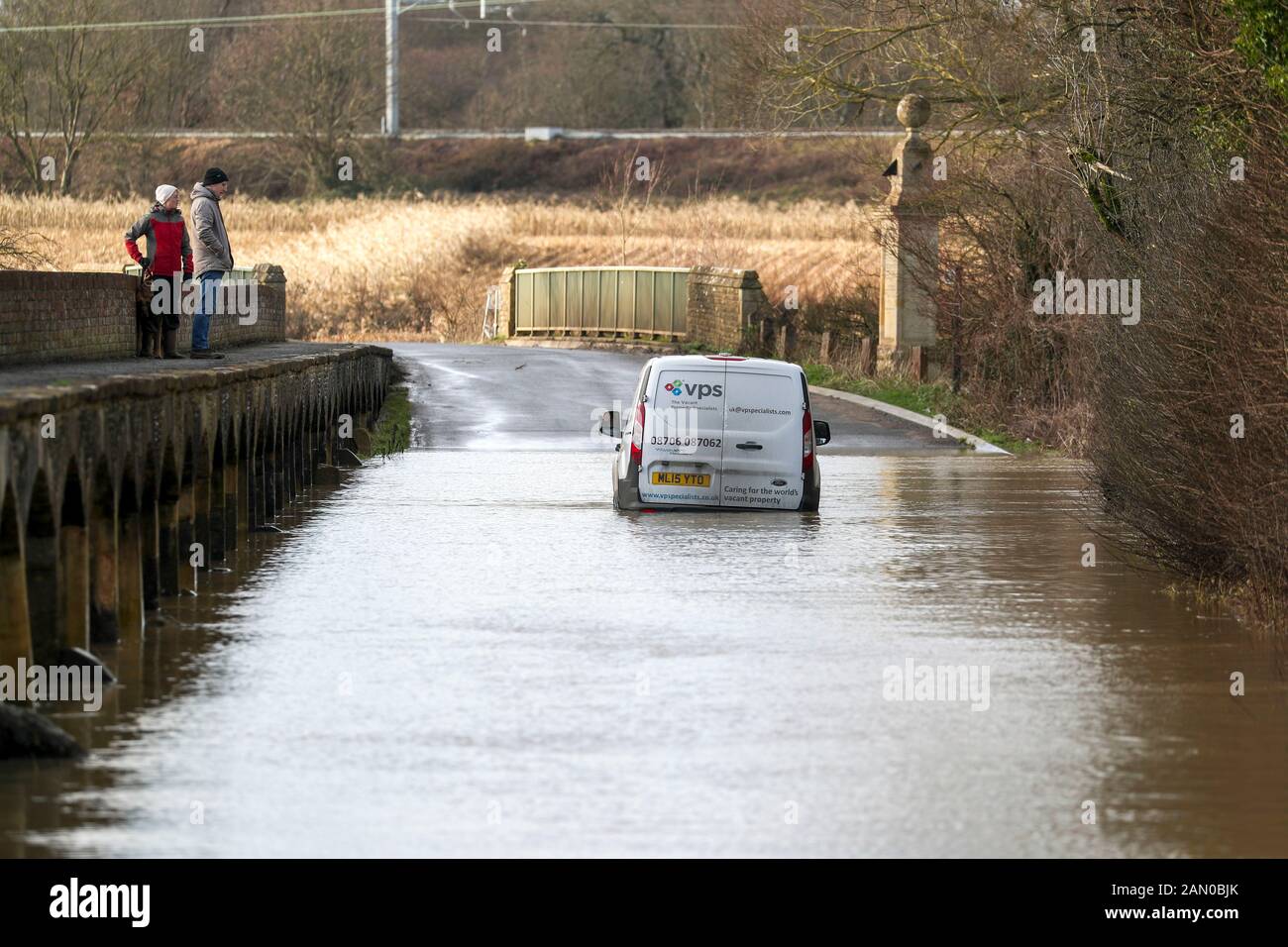 A van is stuck in flood water near Kellaways in Wiltshire after the ...