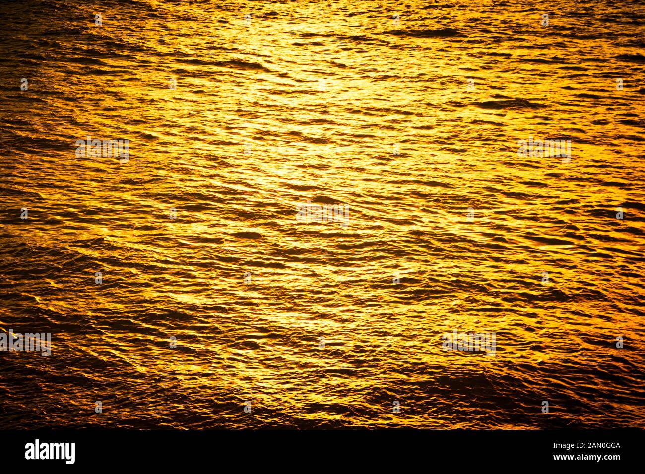 Ocean water texture from above in evening light Stock Photo - Alamy