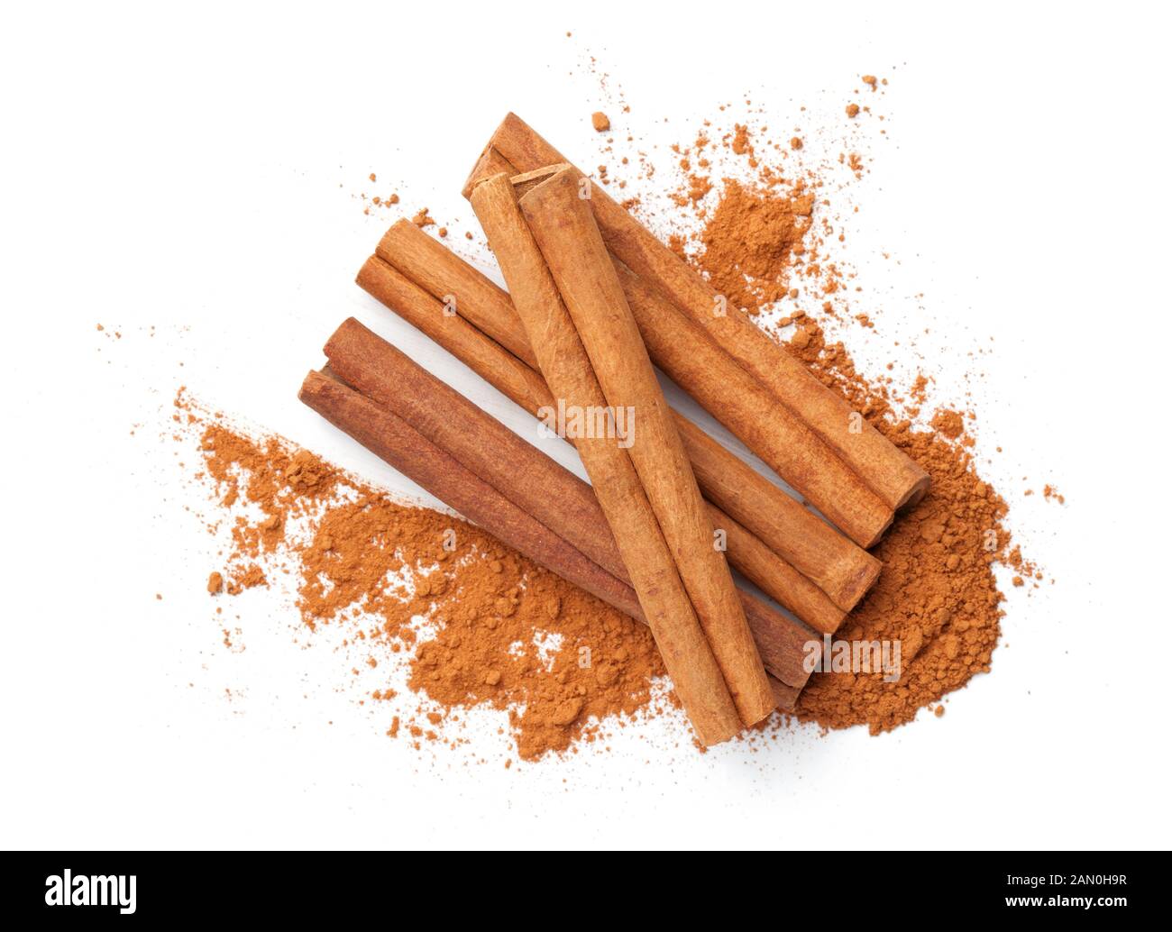 Cinnamon sticks and powder isolated on white background. Top view, flat ...